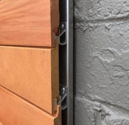 Vertical Rainscreen Design with Garapa Wood Siding