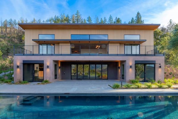 Fire-Resistant Siding Creates A Dramatic Wood Ceiling Soffit That Soars