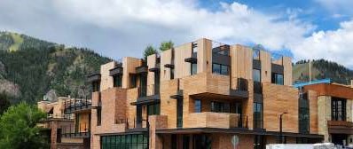 Vertical Rainscreen Design with Garapa Wood Siding